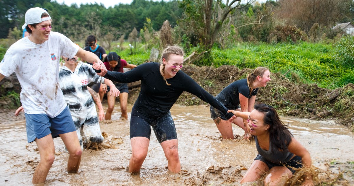 Mucking about at second annual Massey Mud Run - Massey University