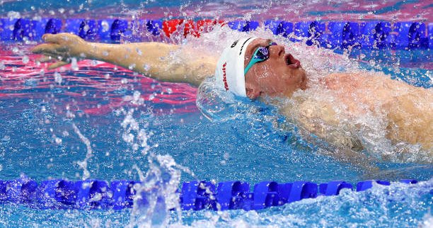 Swimming toward success: travel fund fuels student athlete’s global ...